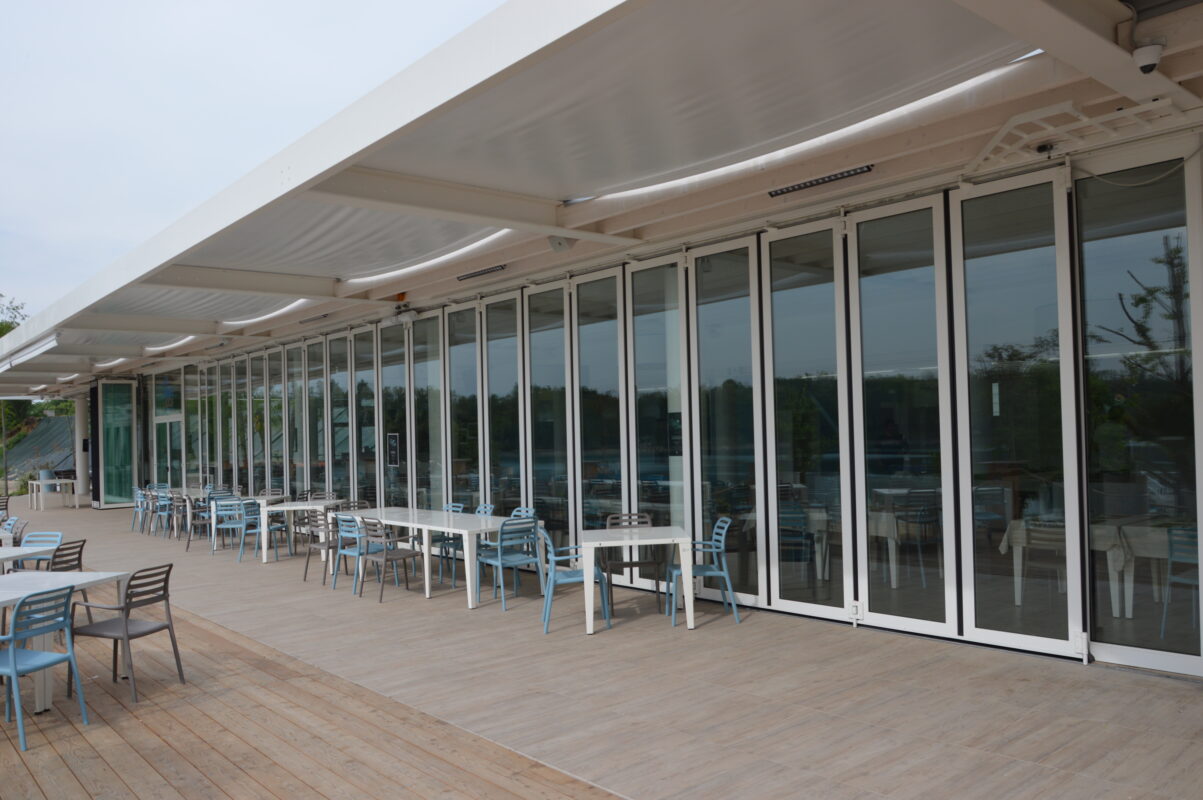 Portone a libro Glass Door I - Sicc Srl chiusure industriali